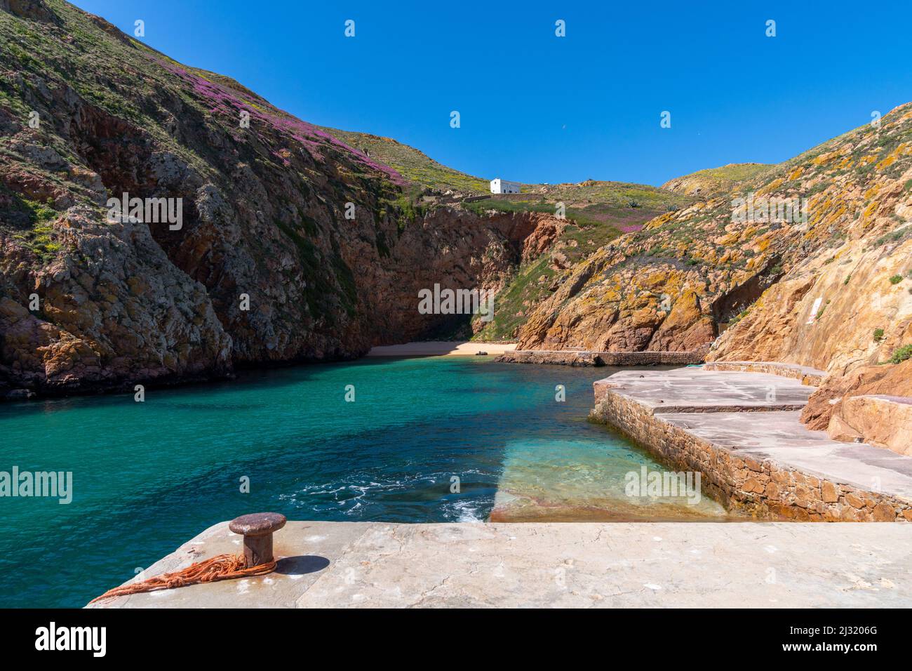 An idyllic cove with small beach on a small Atlantic island wirth ...