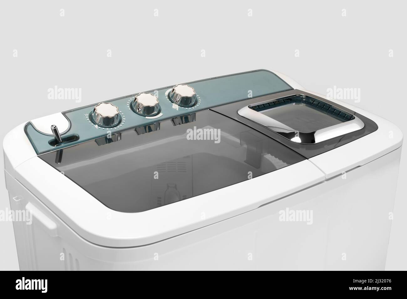 A new semi-automatic washing machine on a white background Stock Photo ...