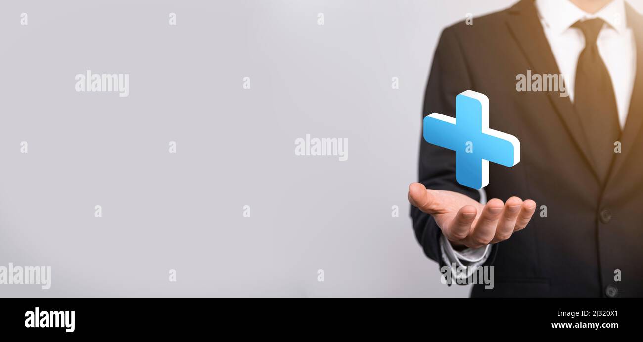Businessman hold 3D plus icon, man hold in hand offer positive thing ...