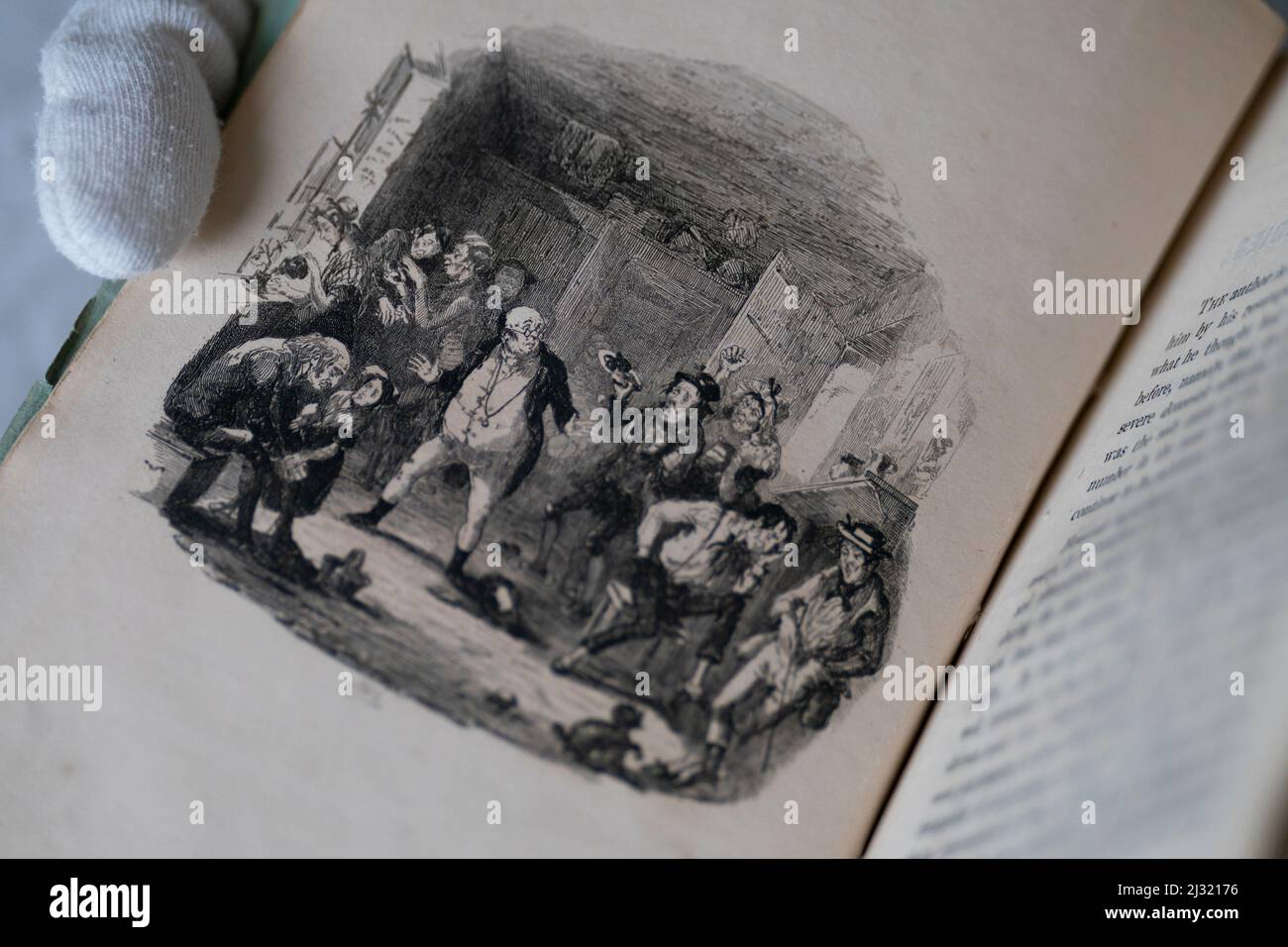 A detail of an original monthly part of The Pickwick Papers, at a ...