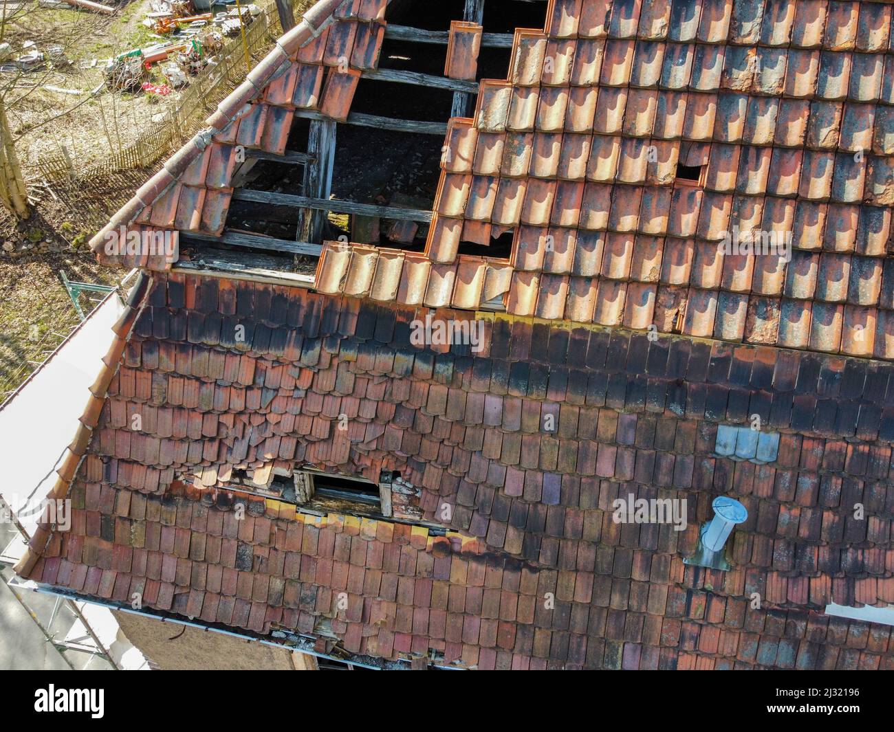 Roof damaged after a storm Stock Photo - Alamy