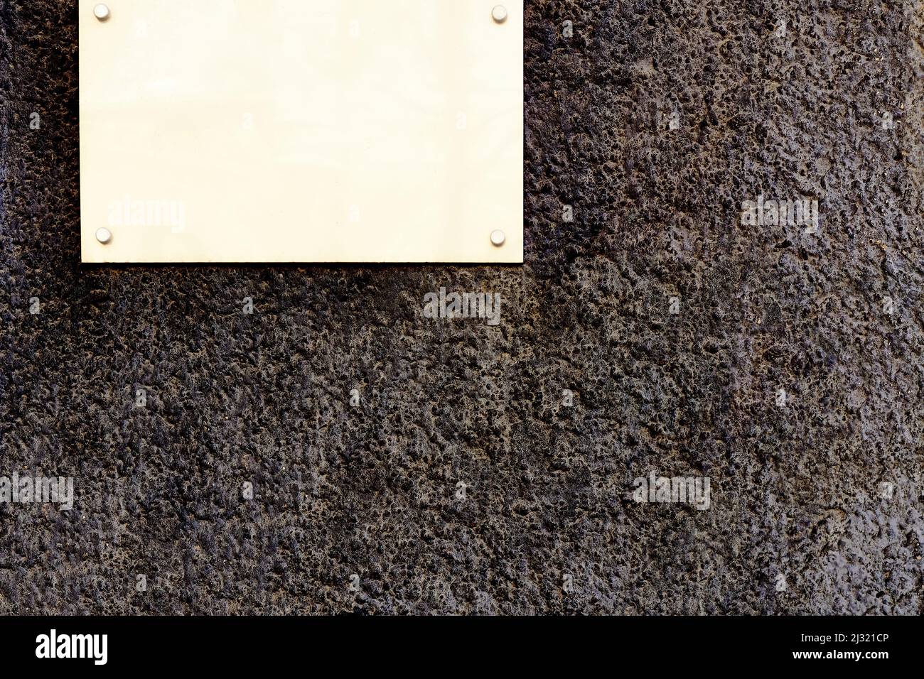 Plaque with place for text on granite wall Stock Photo - Alamy