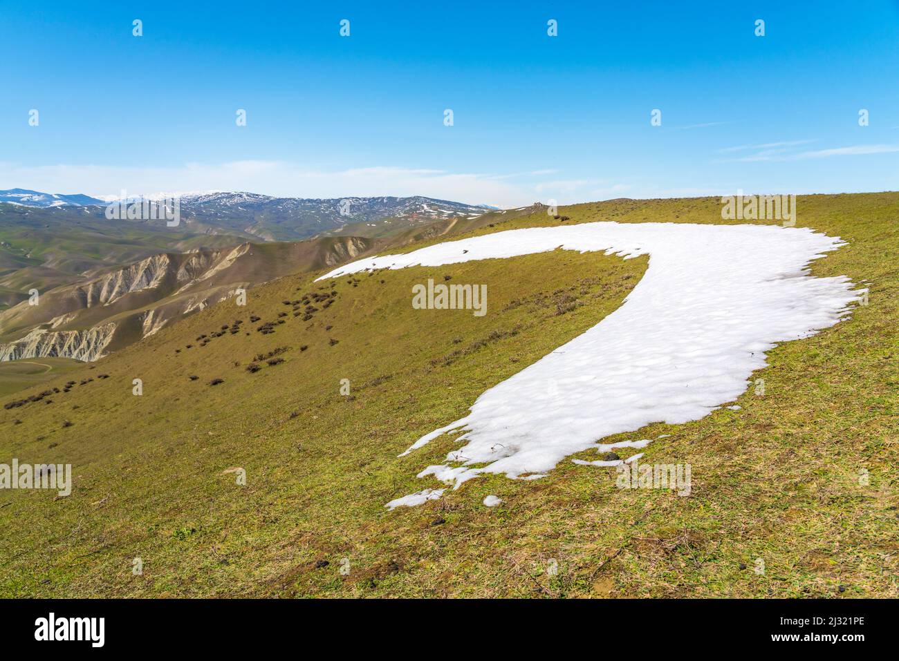 Melting snow on highland mountain hi-res stock photography and images ...