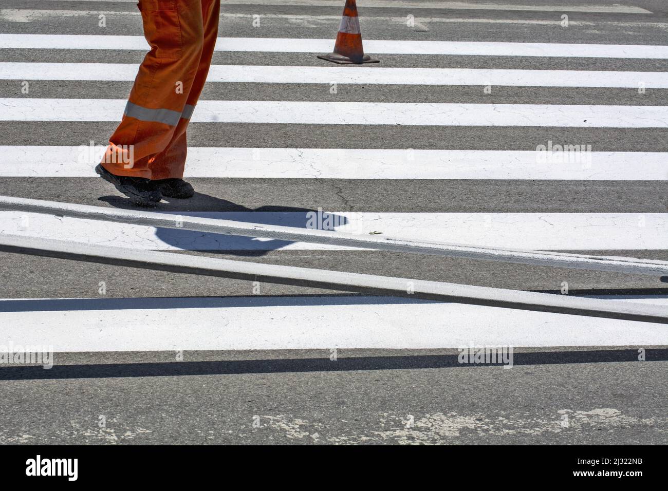 Workers paint street lines hi-res stock photography and images - Alamy