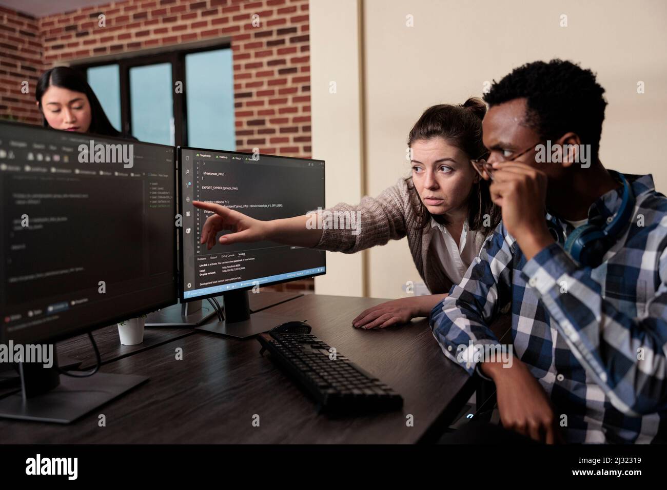 Caucasian software developer signaling on screen data breach and ...