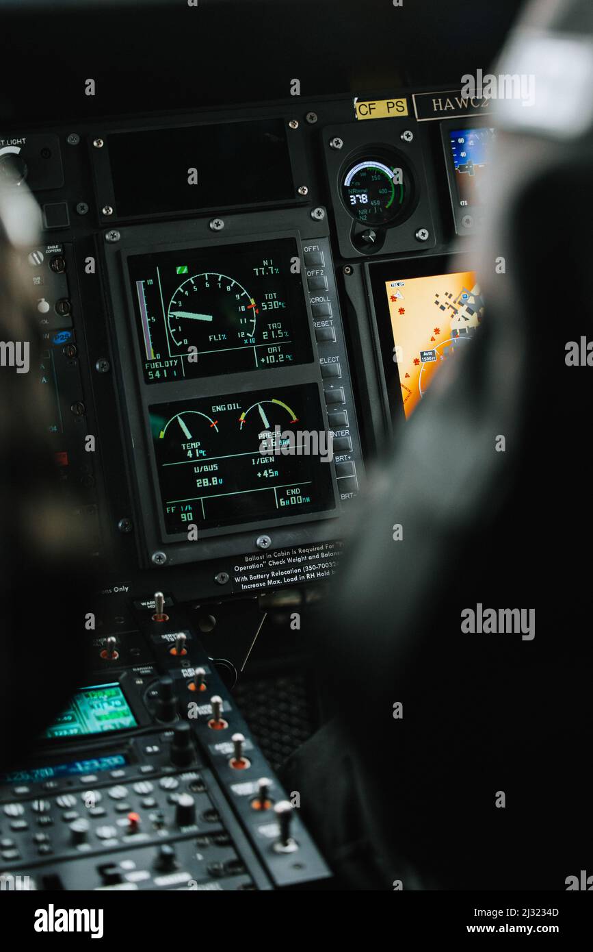 Helicopter cockpit showing digital displays and switches Stock Photo ...