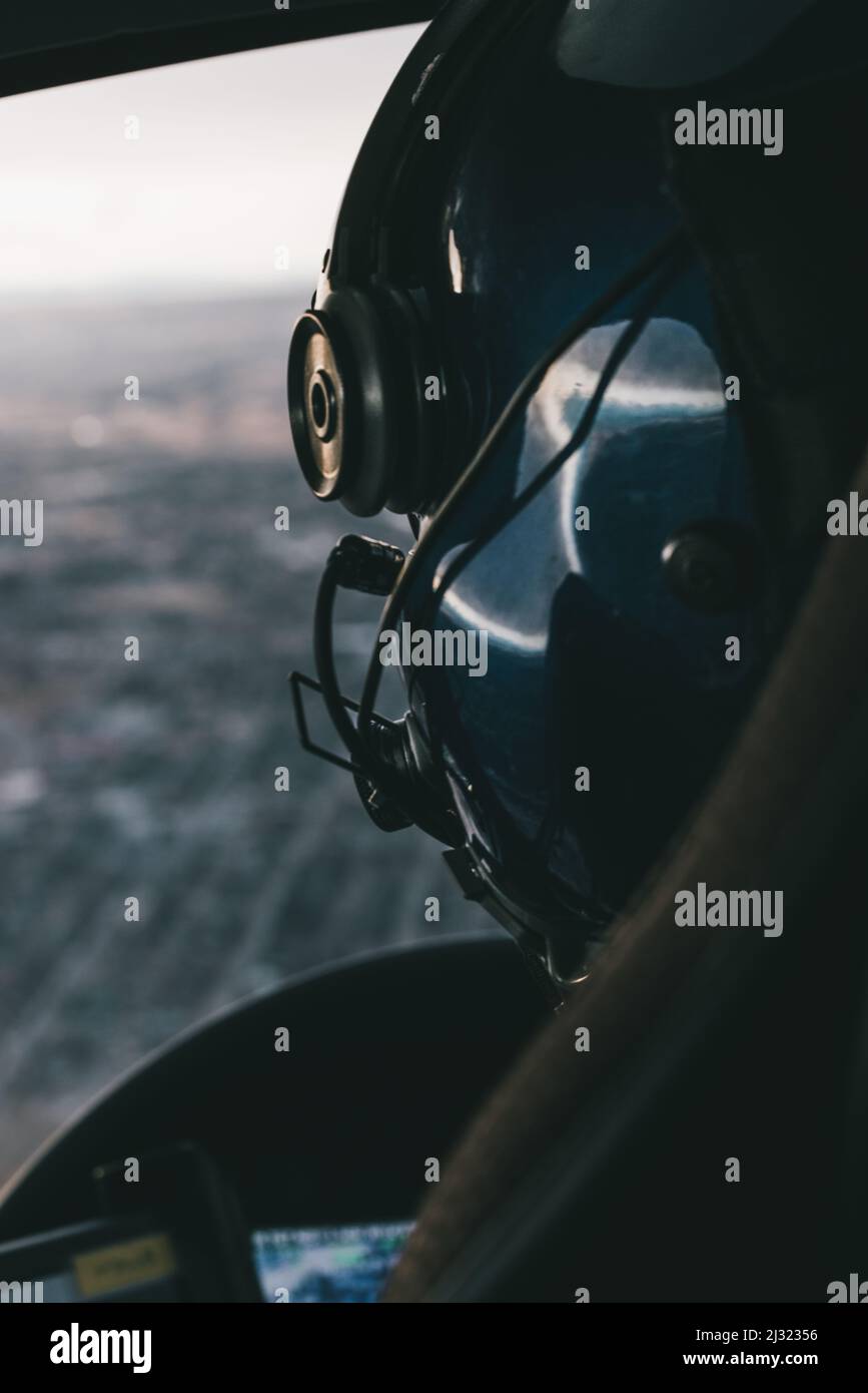 Helicopter pilots helmet during flight Stock Photo - Alamy