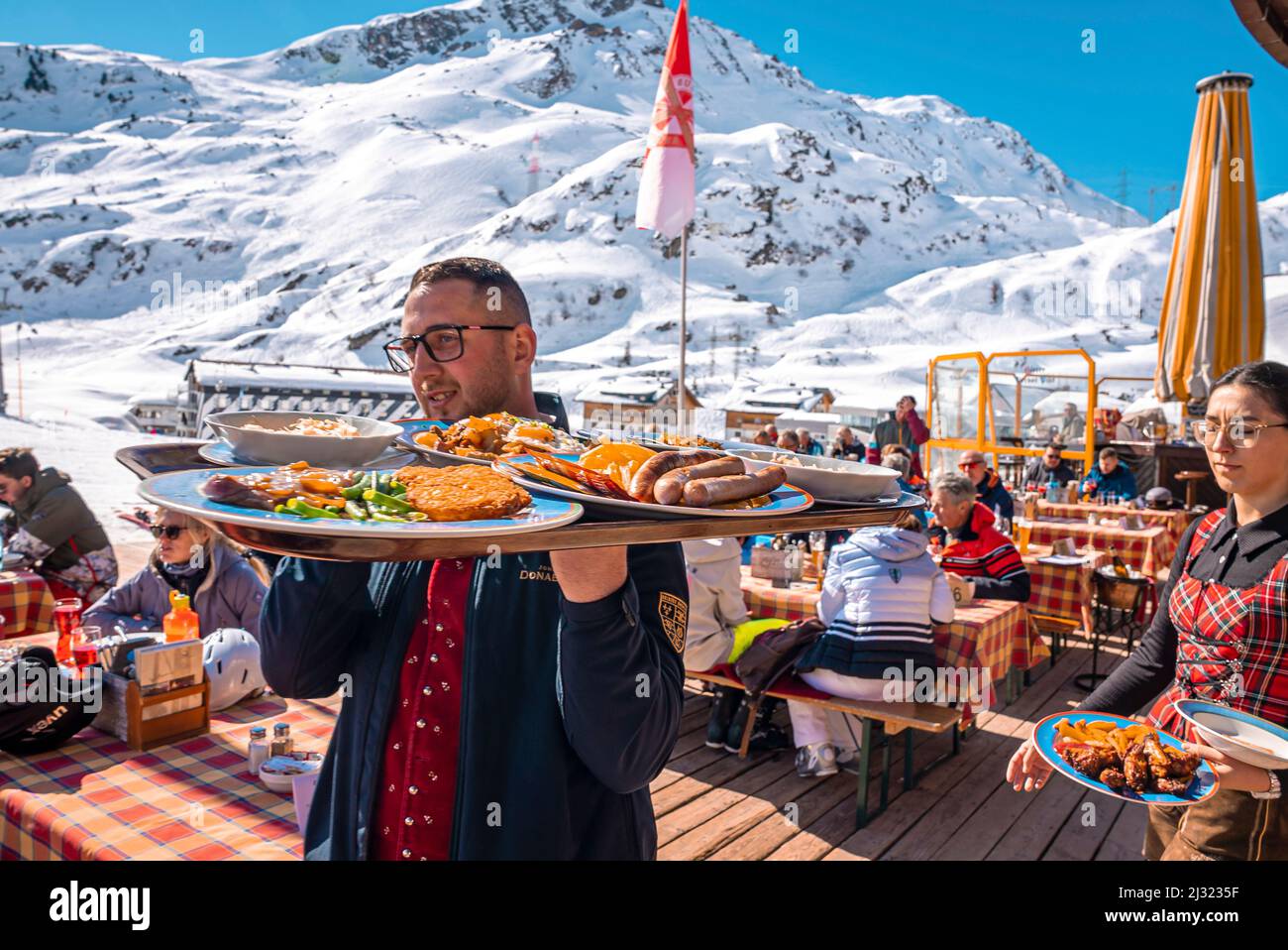 Waiter carrying food tray hi-res stock photography and images - Alamy