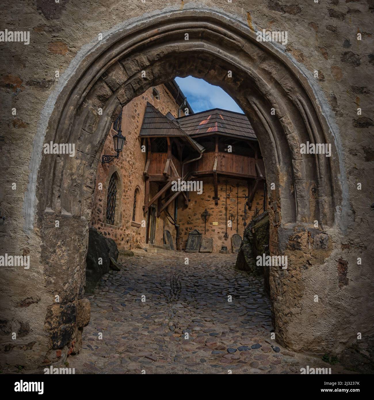 The Gothic castle is the dominant feature of the historic town of Loket ...