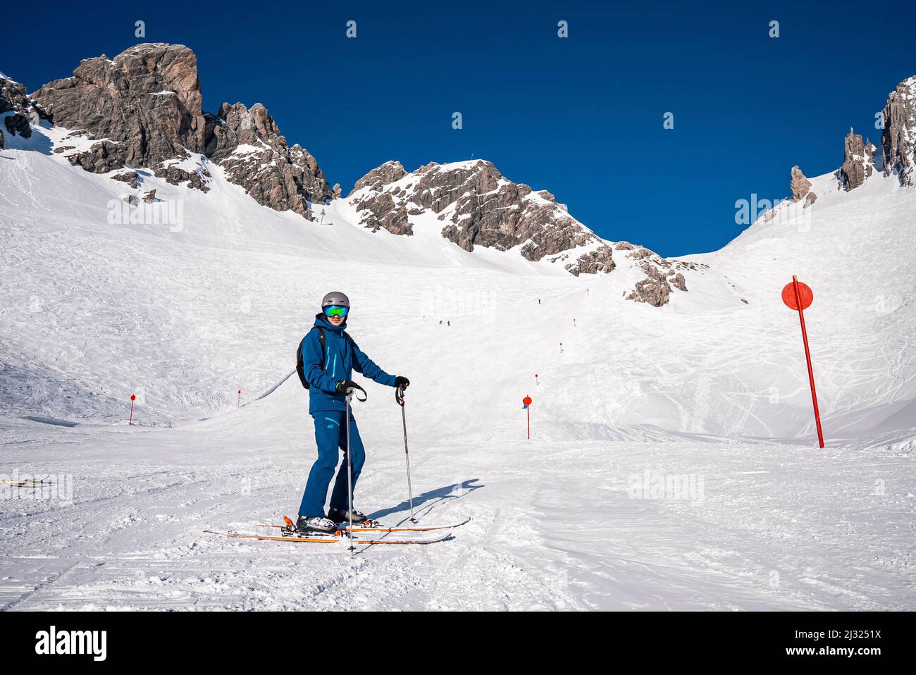 Male skier standing on slope hi-res stock photography and images - Alamy