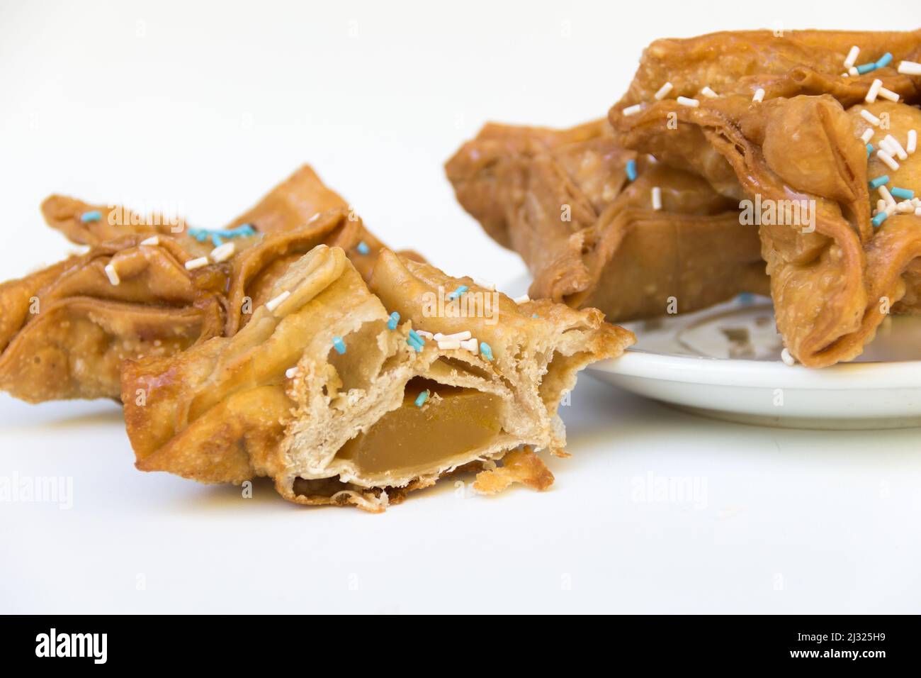 Fried pastry with quince and batata typical of south america gastronomy ...