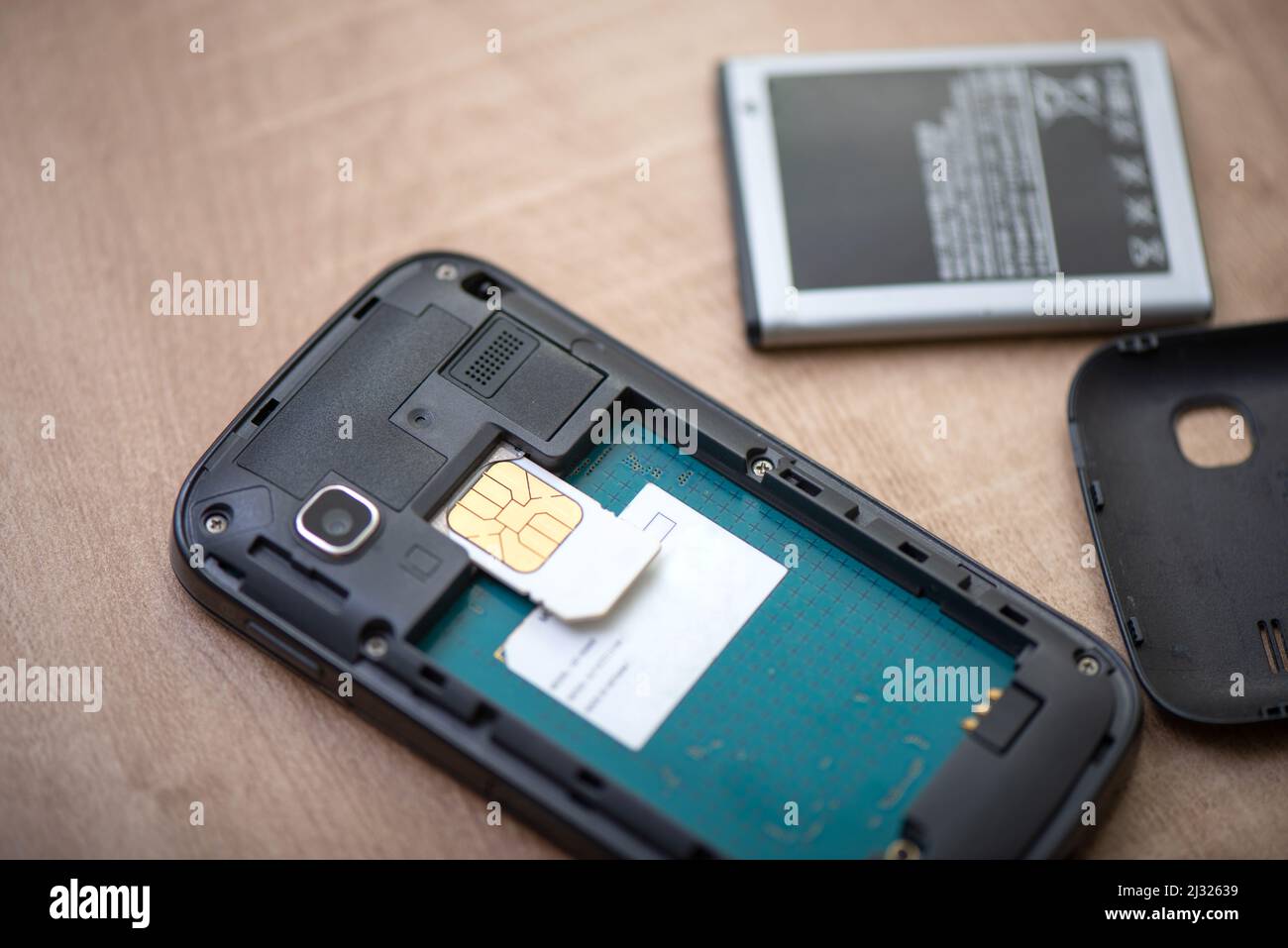 SIM card for smart phone. Changing the SIM card Stock Photo - Alamy