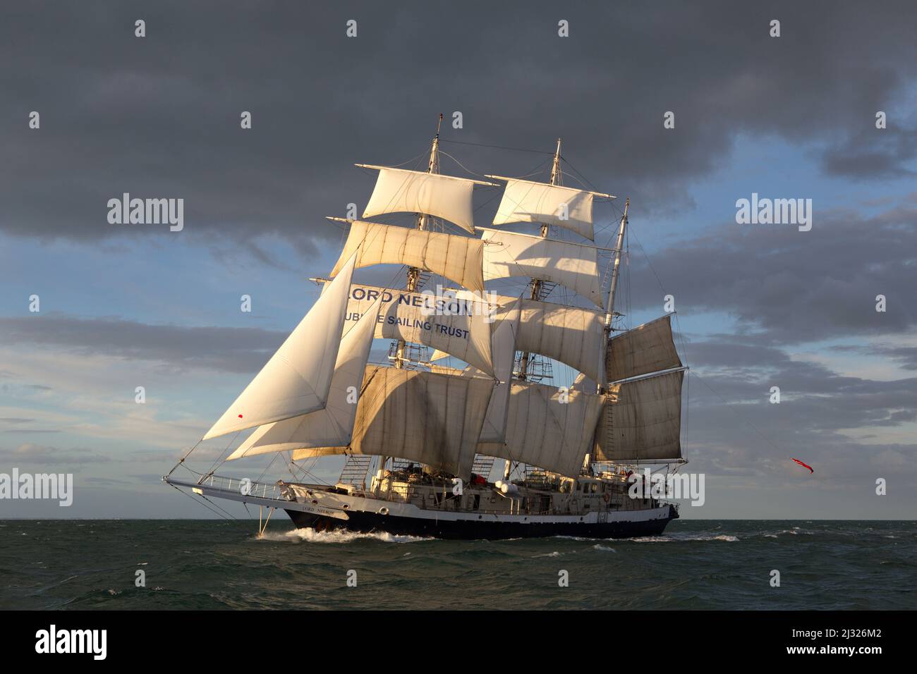 Tall Ship Lord Nelson West of the Isle of Wight Stock Photo - Alamy