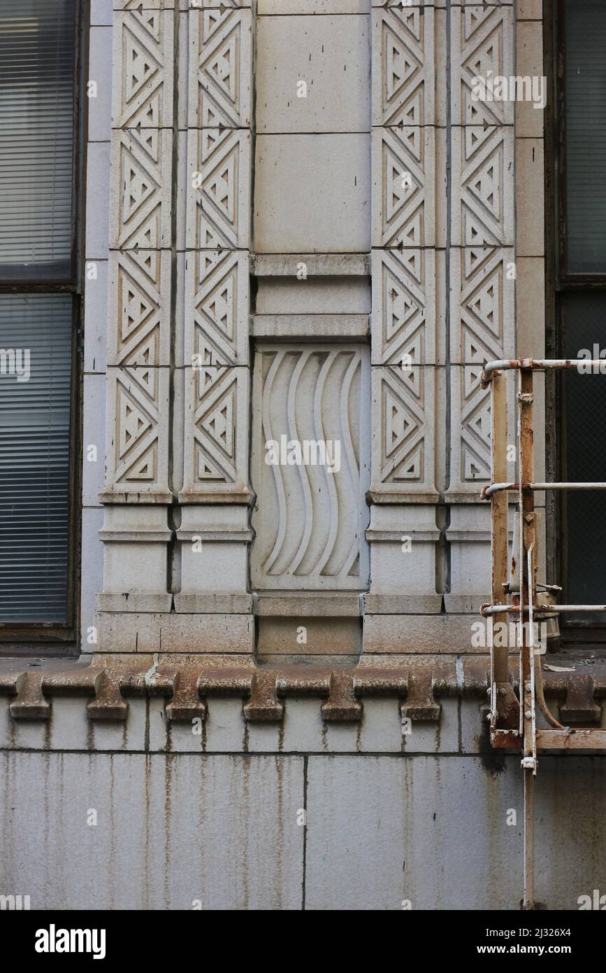 Vintage old terra cotta building with ornate patterns and decorations ...