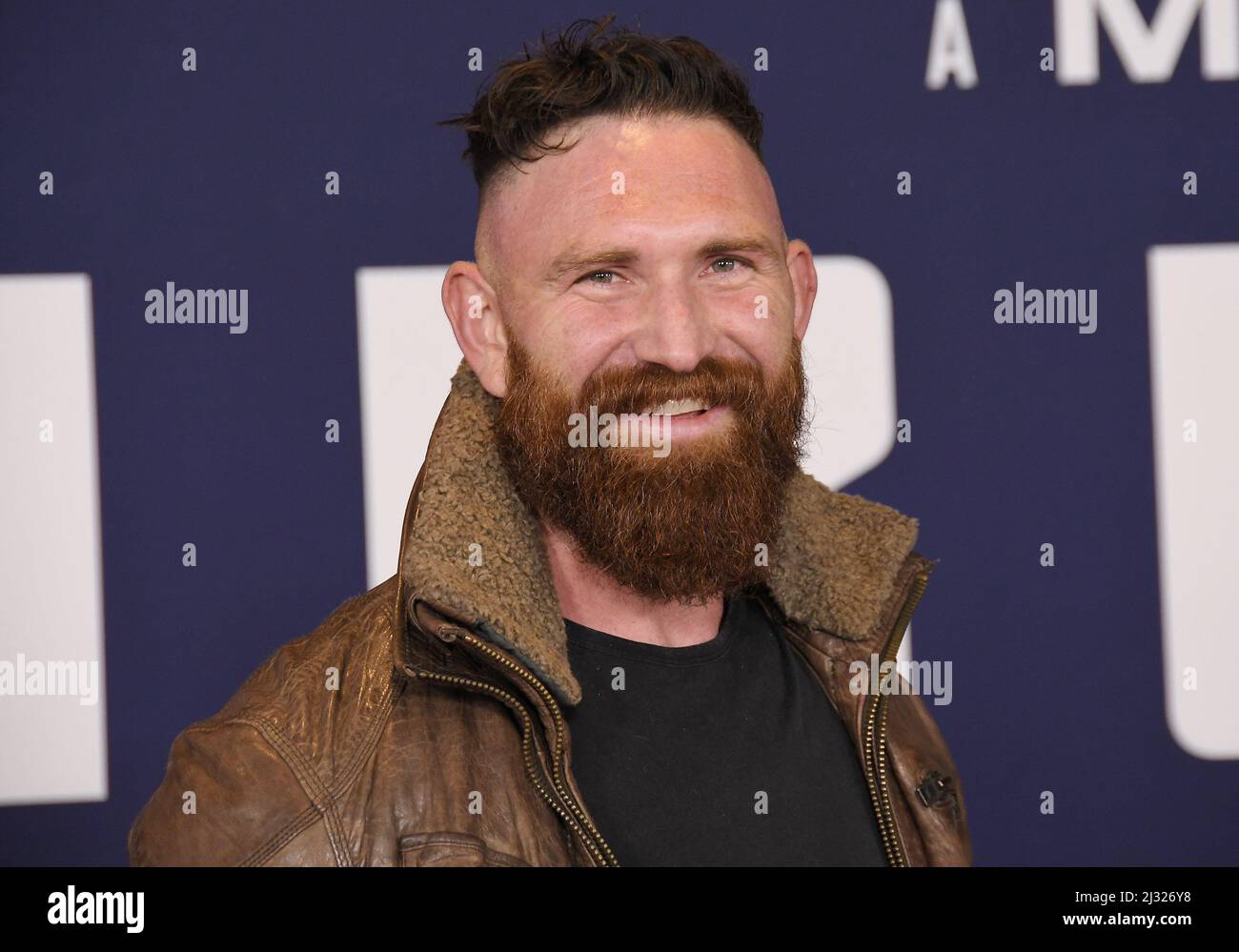 Devan Long arrives at the AMBULANCE Los Angeles Premiere held at the ...