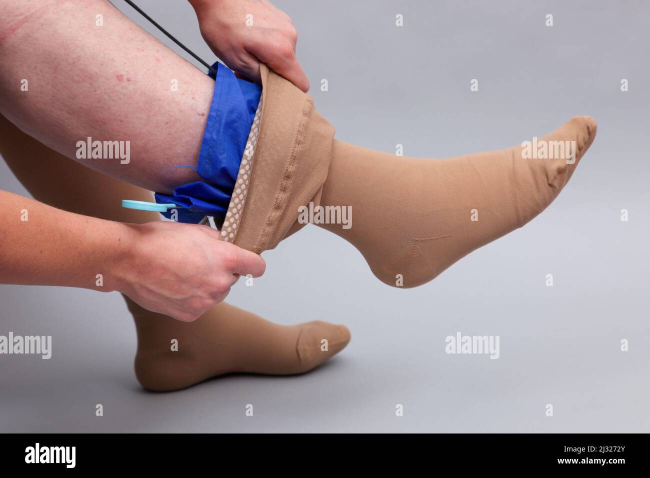 Compression stocking aid hi-res stock photography and images - Alamy