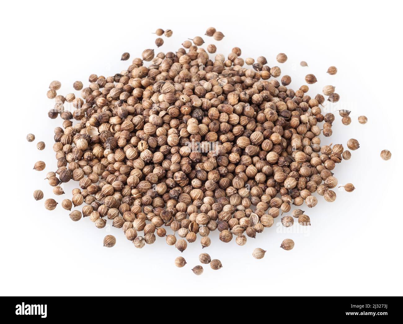 Heap of dried coriander seeds isolated on white background Stock Photo - Alamy