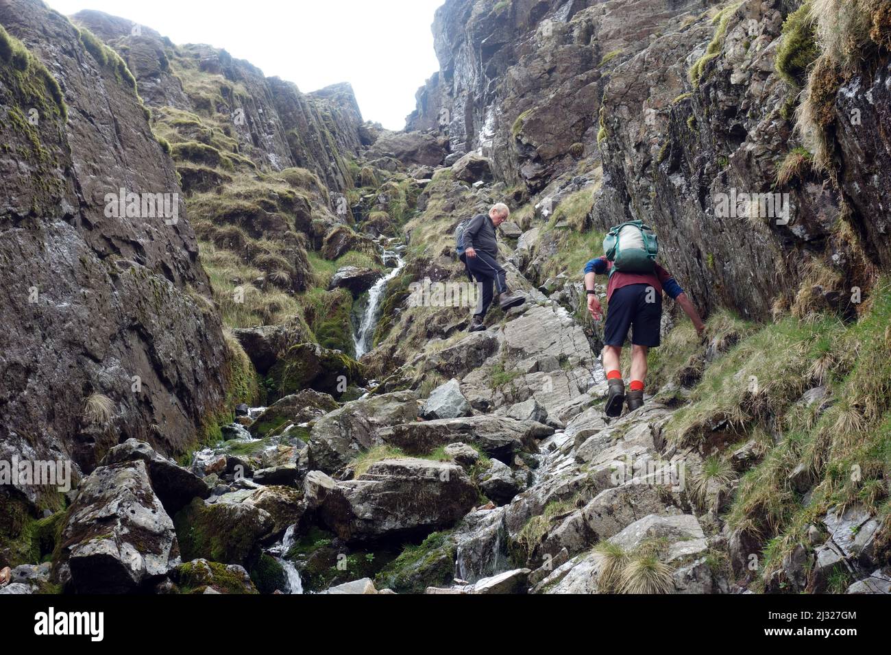Two Men Climbing a Gully to Foxes Tarn near the Wainwright 'Scafell' in ...