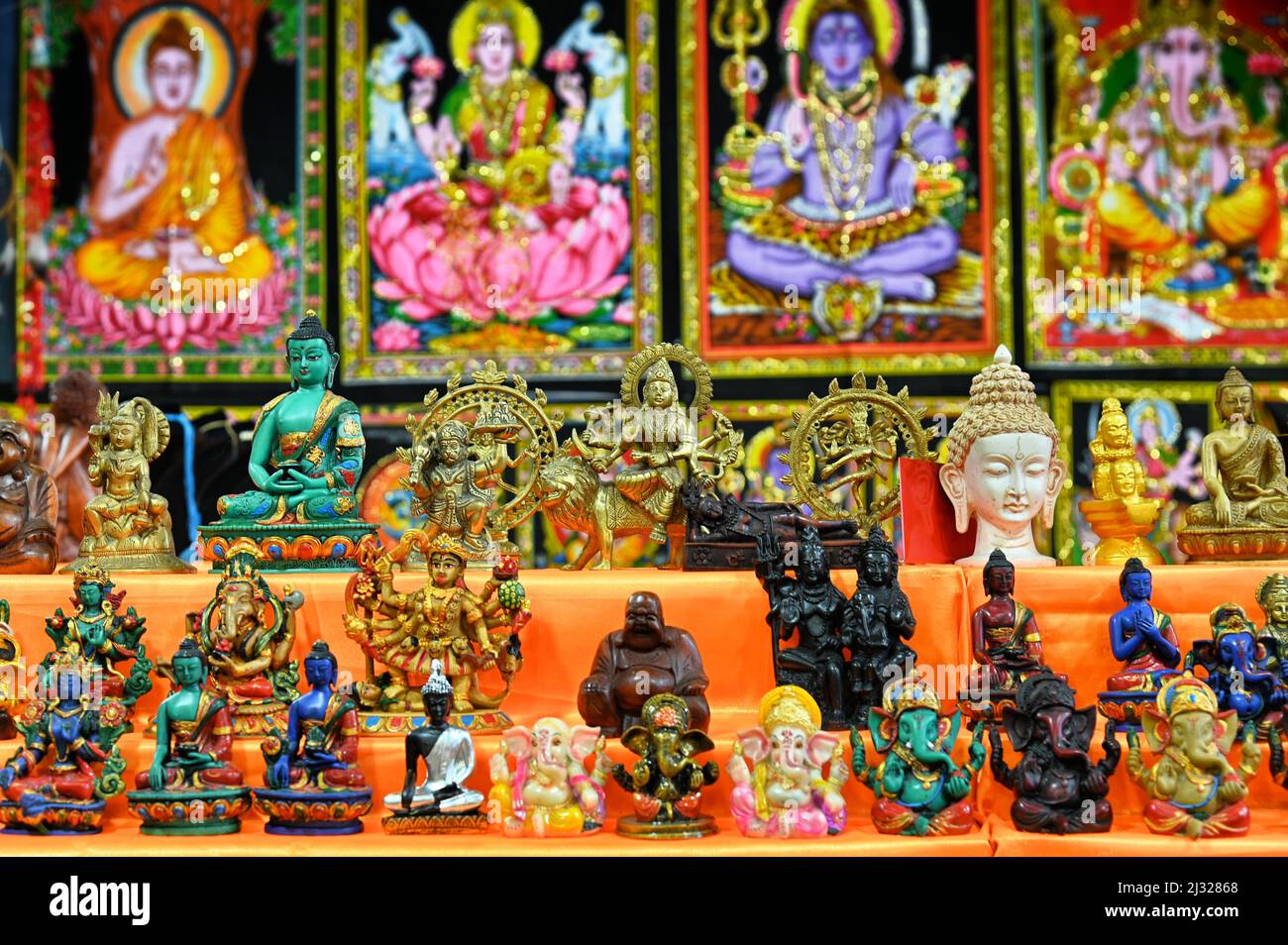 The wooden carved handmade Hindi masks statues and jewelry on display ...