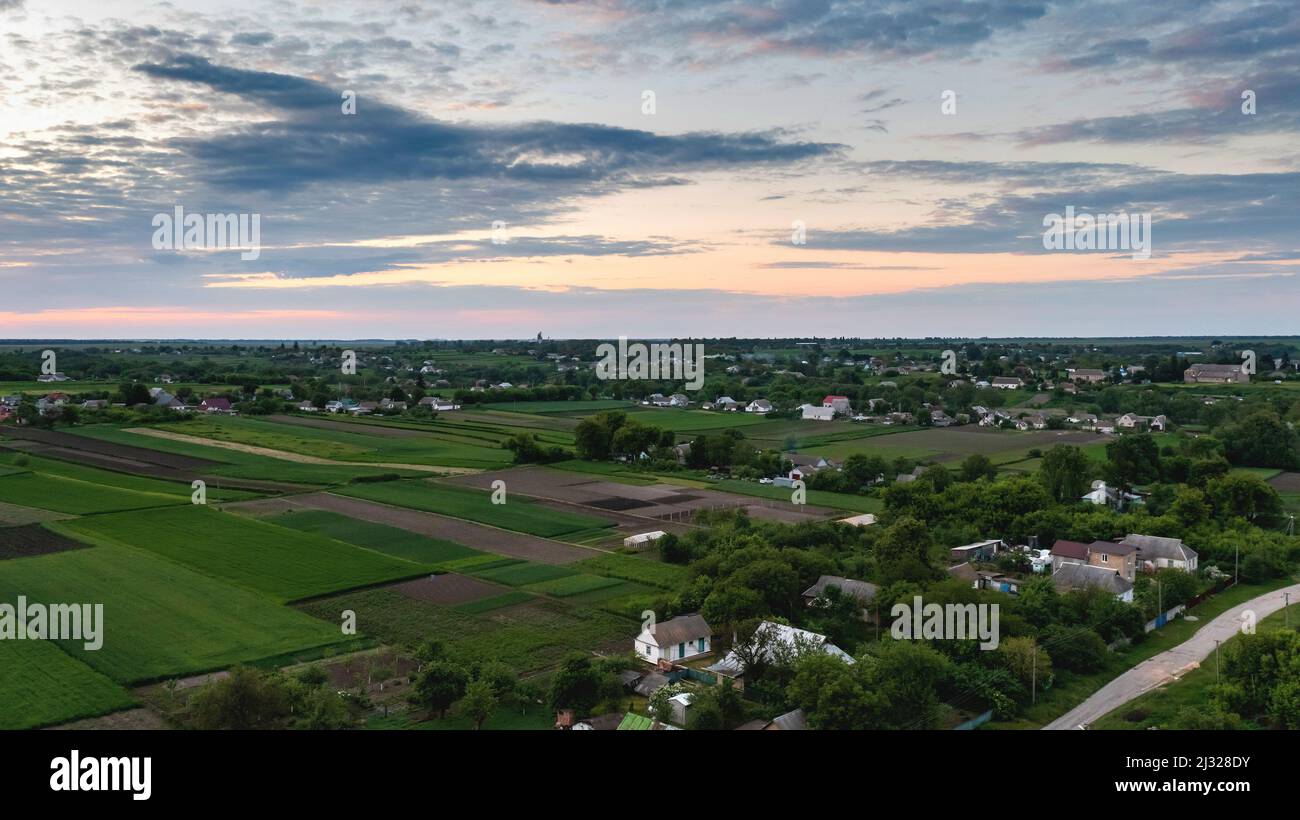 Aerial shot of the countryside with agricultural and livestock farms ...