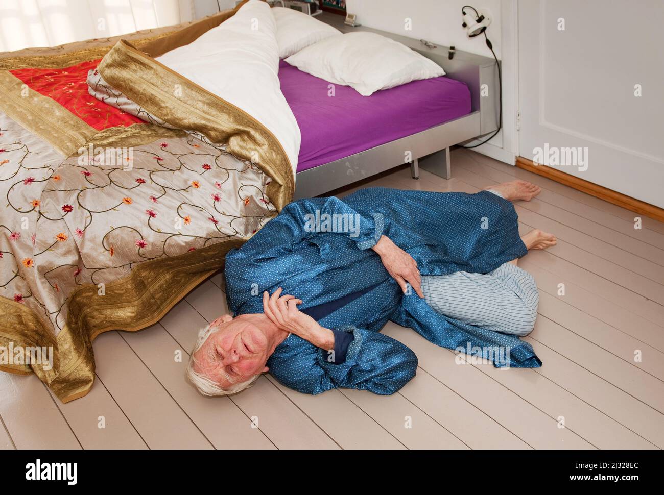 Netherlands, an elderly man has fallen to the ground in the bedroom ...