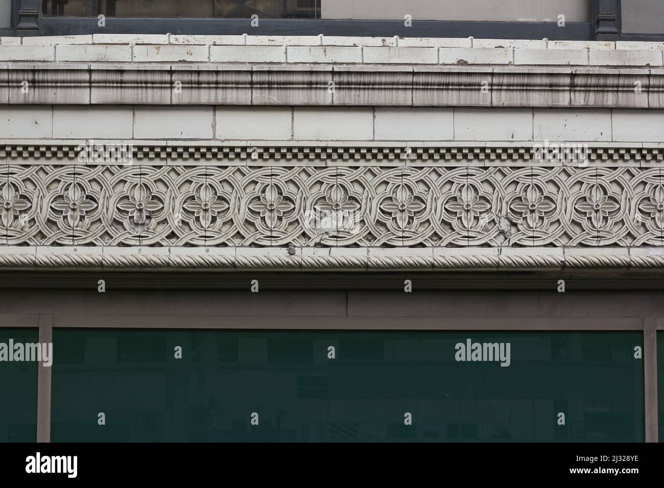 Vintage old terra cotta building with ornate patterns and decorations ...