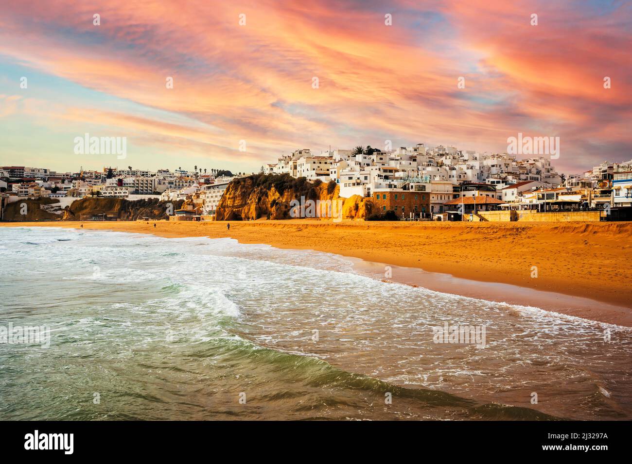 Dramatic view of old town and beach in Albufeira, Algarve, Portugal ...