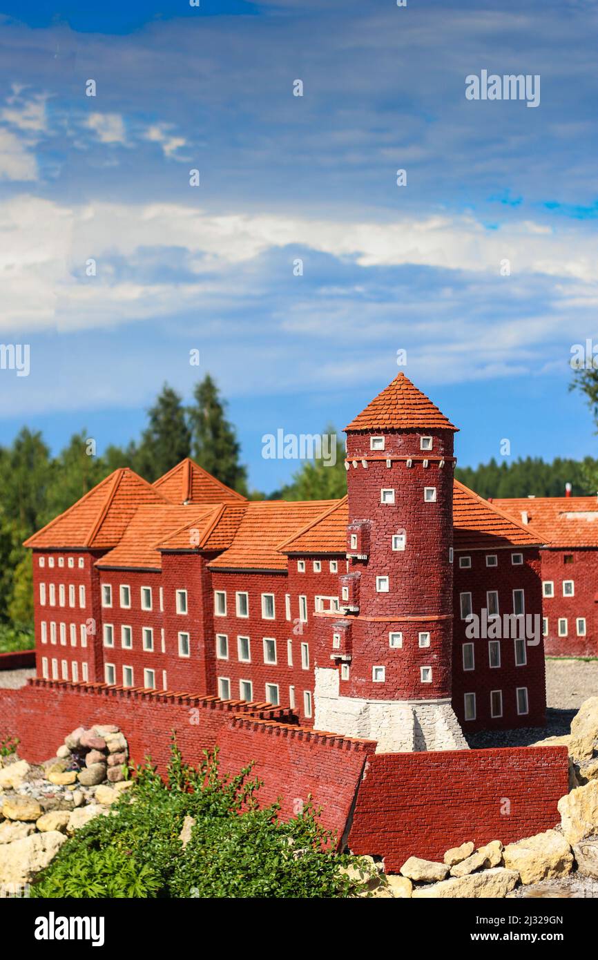 Close-up on miniature red brick gothic castle Stock Photo - Alamy