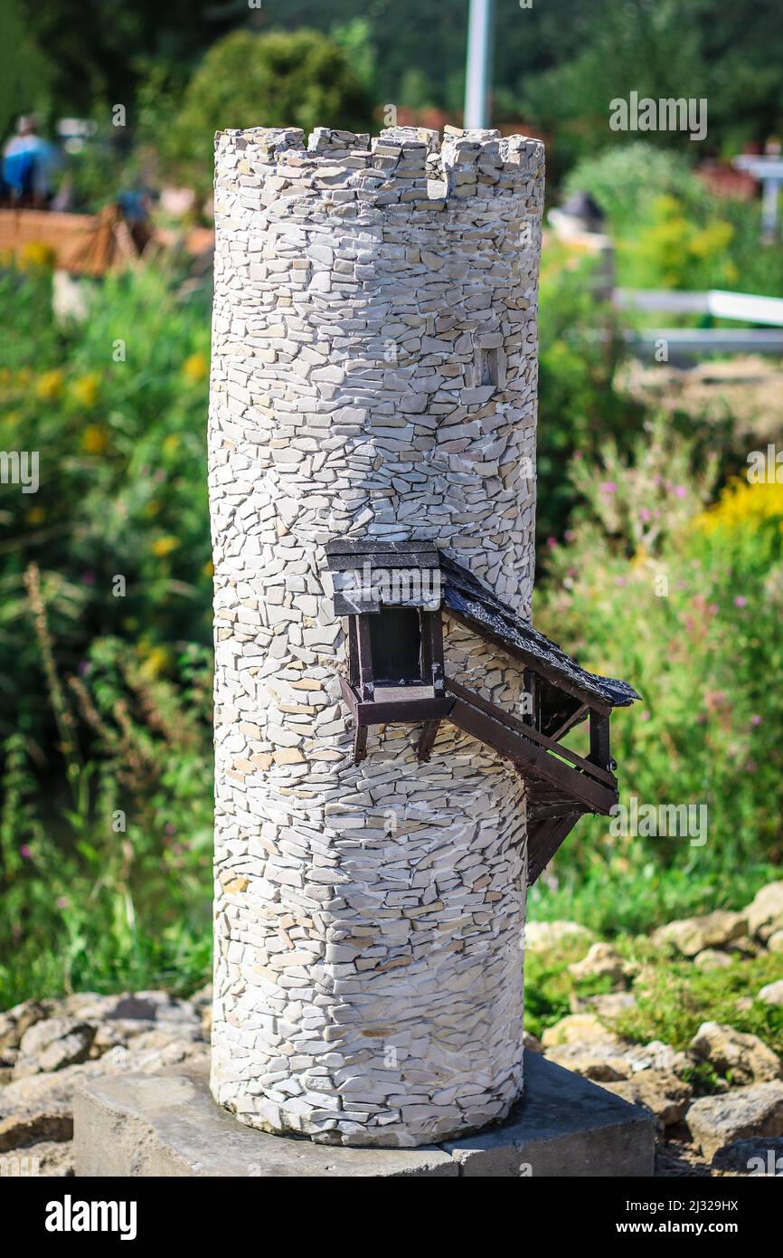 Tower of miniature stone medieval castle Stock Photo - Alamy