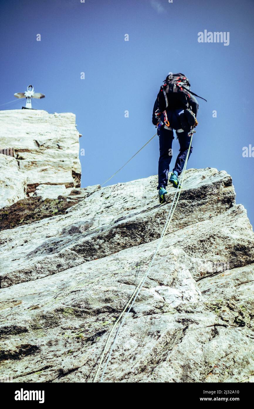 Climbers abseiling from the Zsigmondyspitze in the Zillertal Alps ...