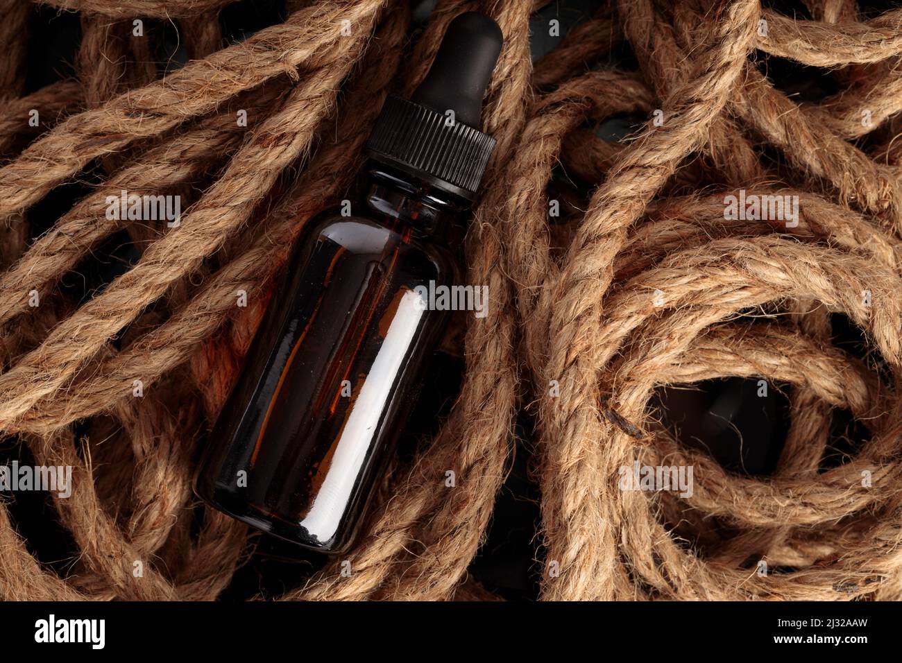 A top view of the bottle with pipette on the rope Stock Photo - Alamy