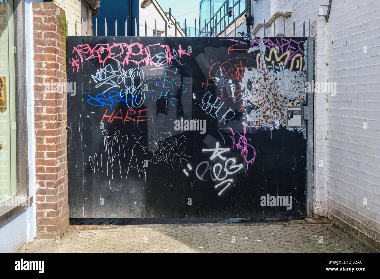 Metal security doors covered in unsightly graffiti and tags in Newquay ...