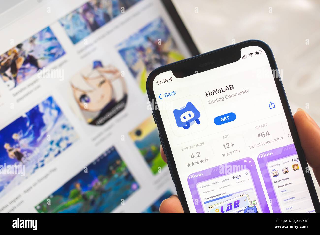 HoyoLAB app. Concept, company making money with popular mobile phone ...