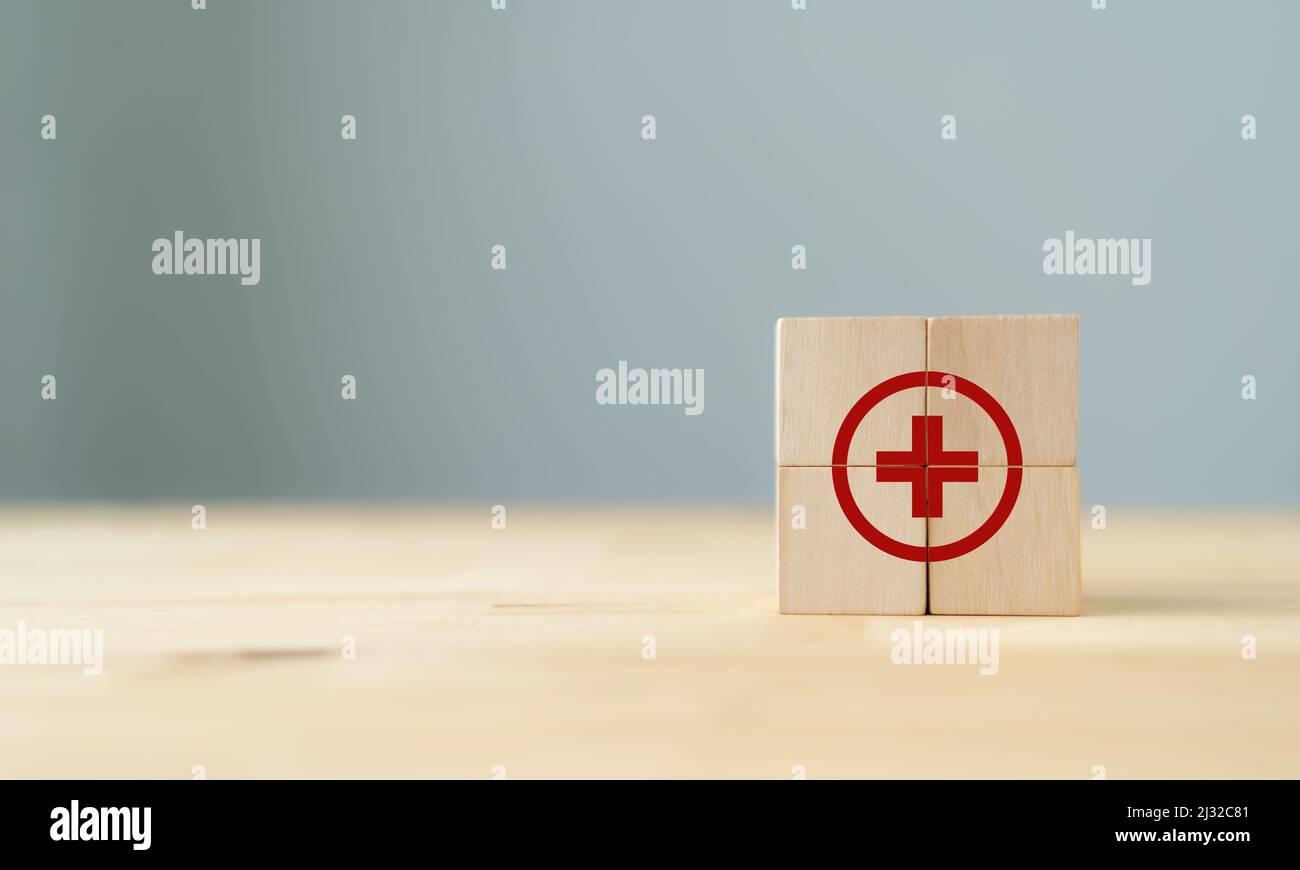 Health and medical treatment concept. The wooden cube with medicine ...