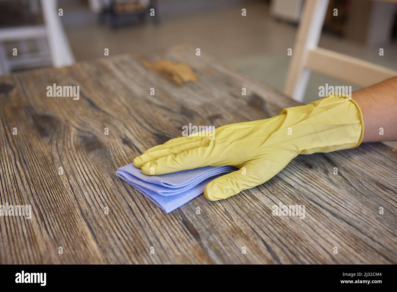 Wiping a surface with disinfectant hi-res stock photography and images ...