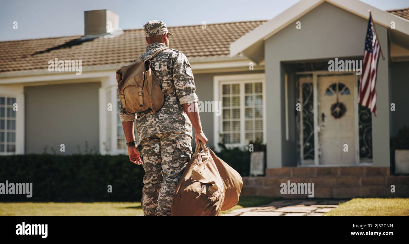 Walking army soldier military luggage hi-res stock photography and ...