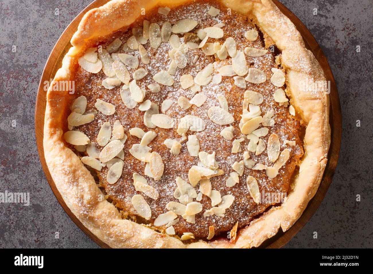 English traditional dessert Bakewell Pudding cake close-up on the table ...