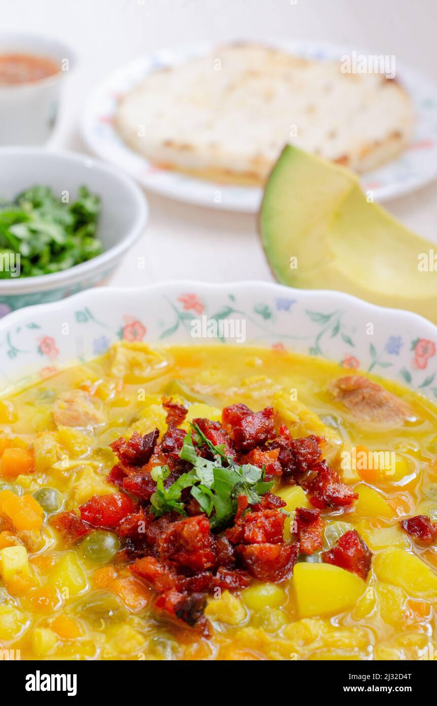 Plate with tripe soup, called mondongo, traditional food from Colombia ...