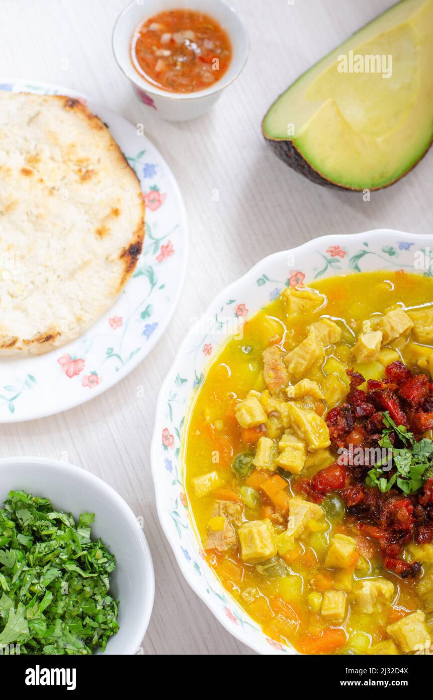 Plate with tripe soup, called mondongo, traditional food from Colombia ...