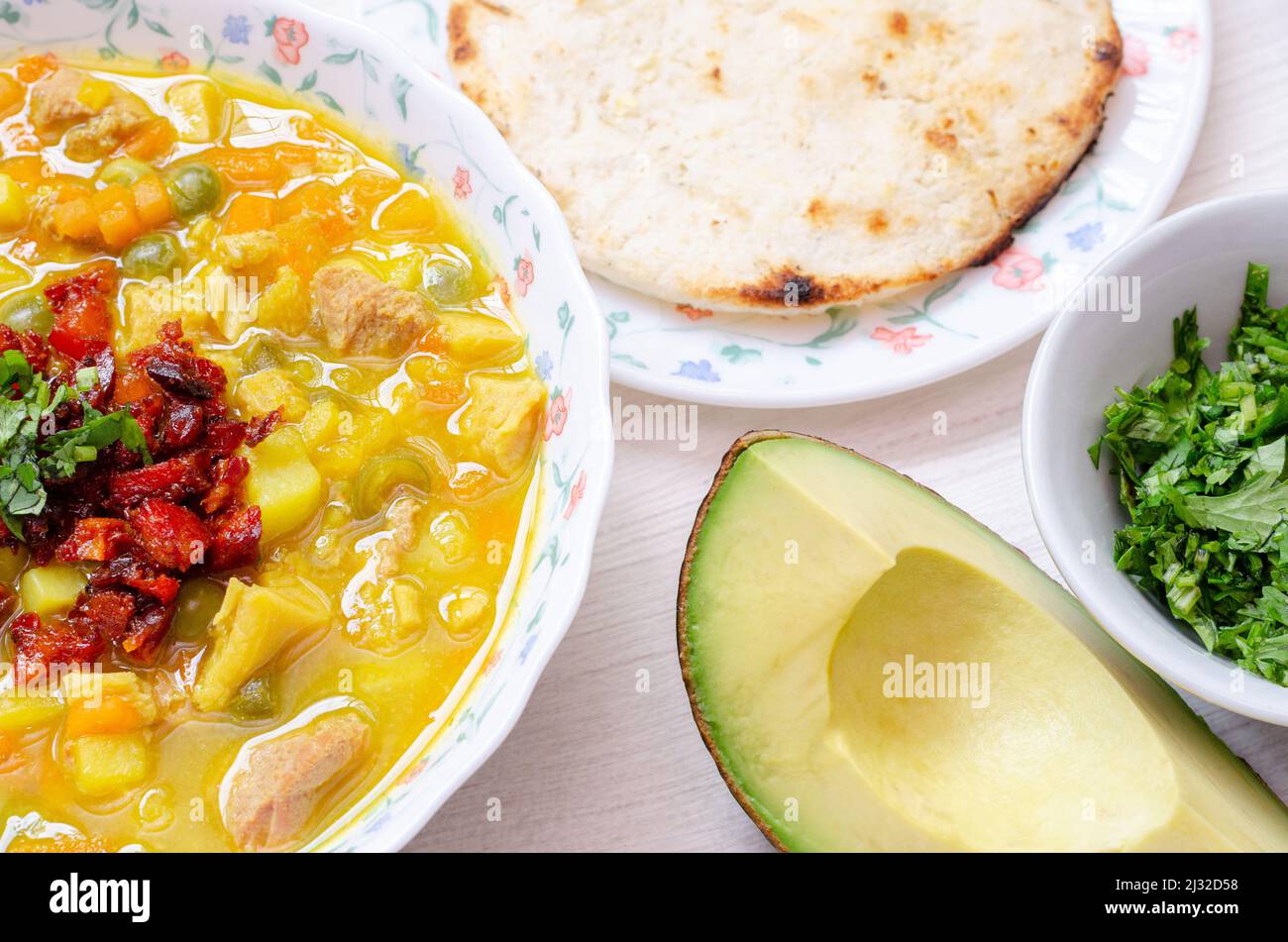 Plate with tripe soup, called mondongo, traditional food from Colombia ...