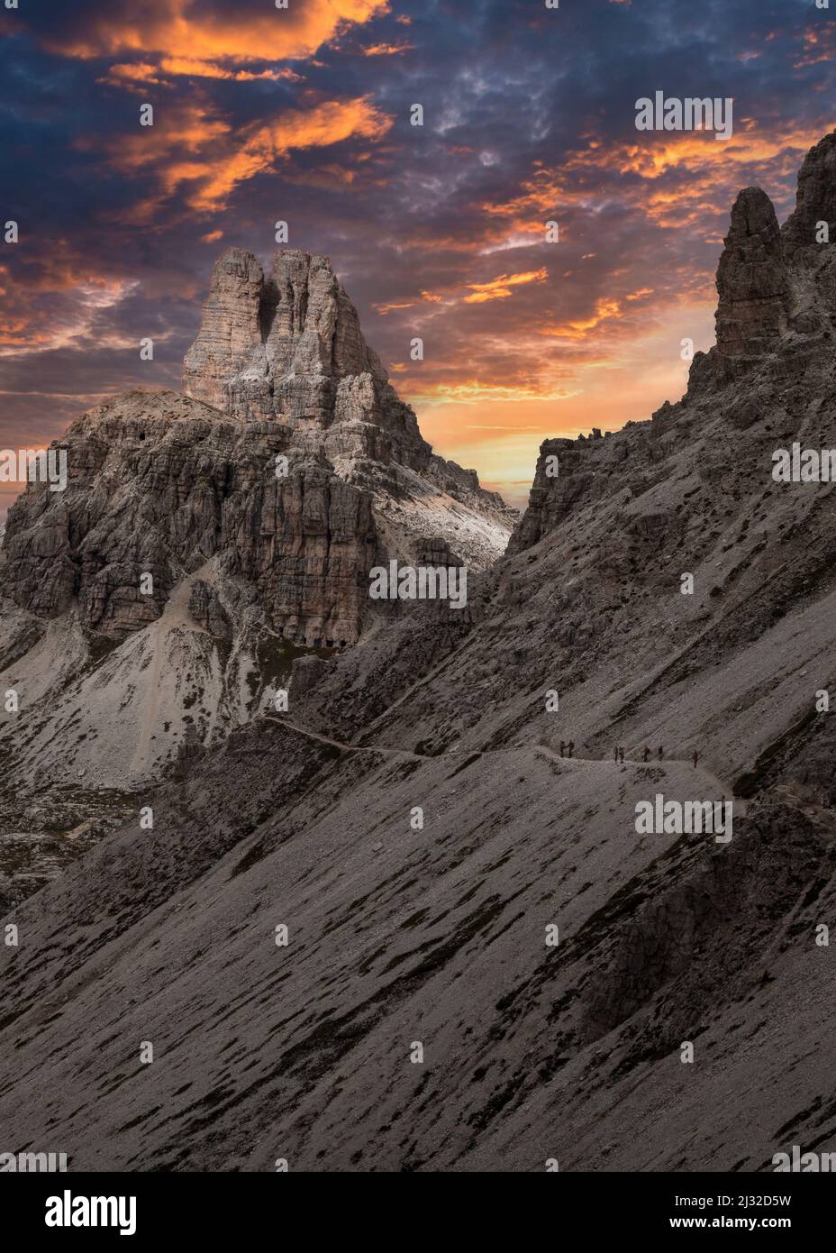 Mountain range. Hiking in the Dolomites with light and shadows, cloudy ...