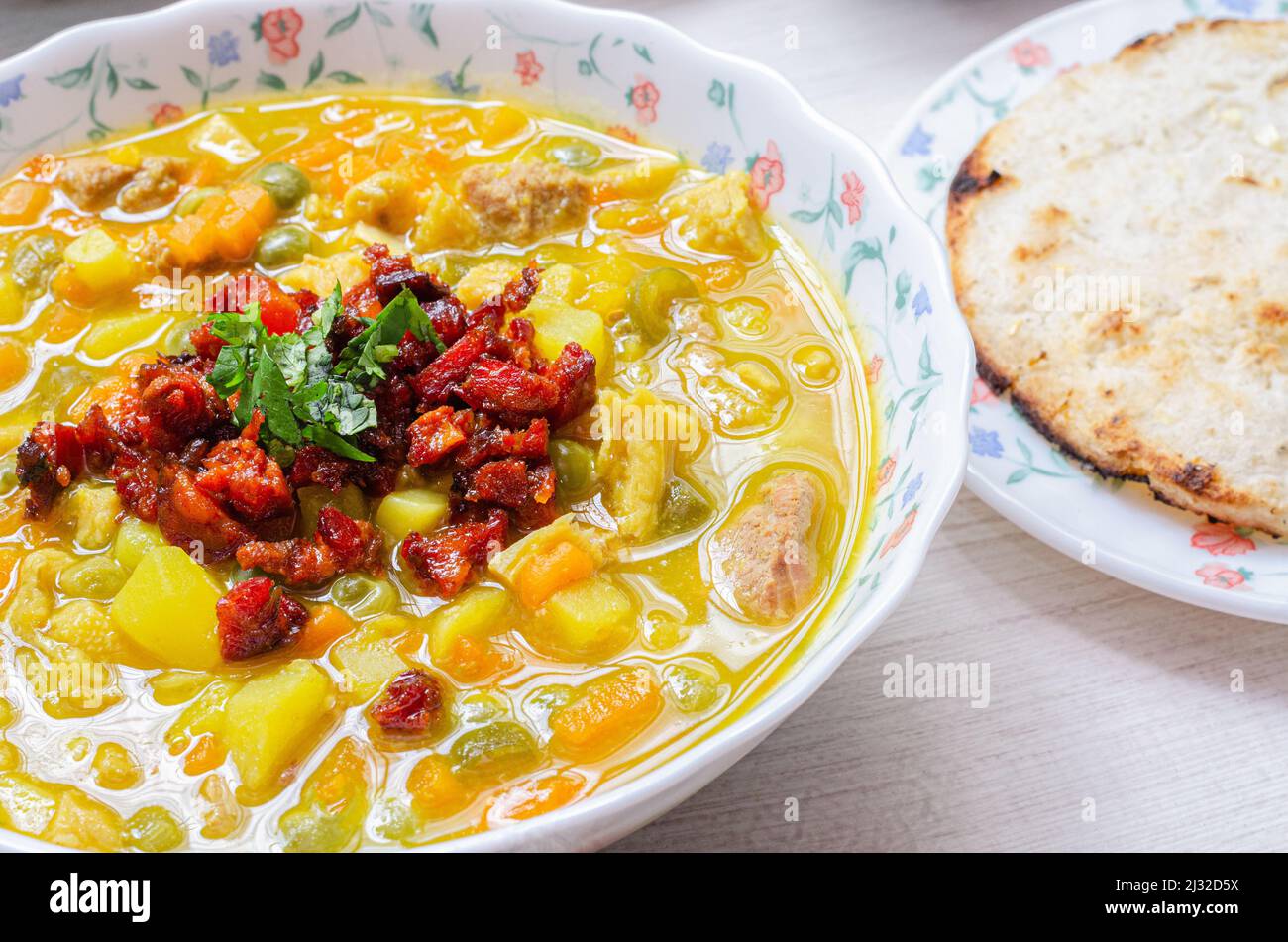 Plate with tripe soup, called mondongo, traditional food from Colombia ...