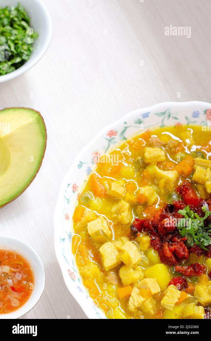 Plate with tripe soup, called mondongo, traditional food from Colombia ...