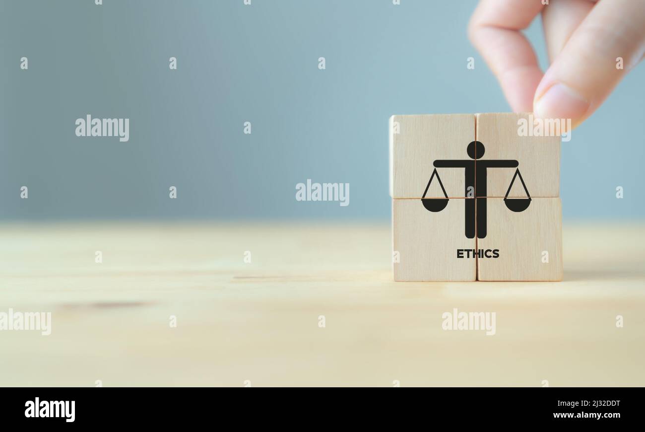 Business ethics concept. Business moral principles concept. Hand holds ...