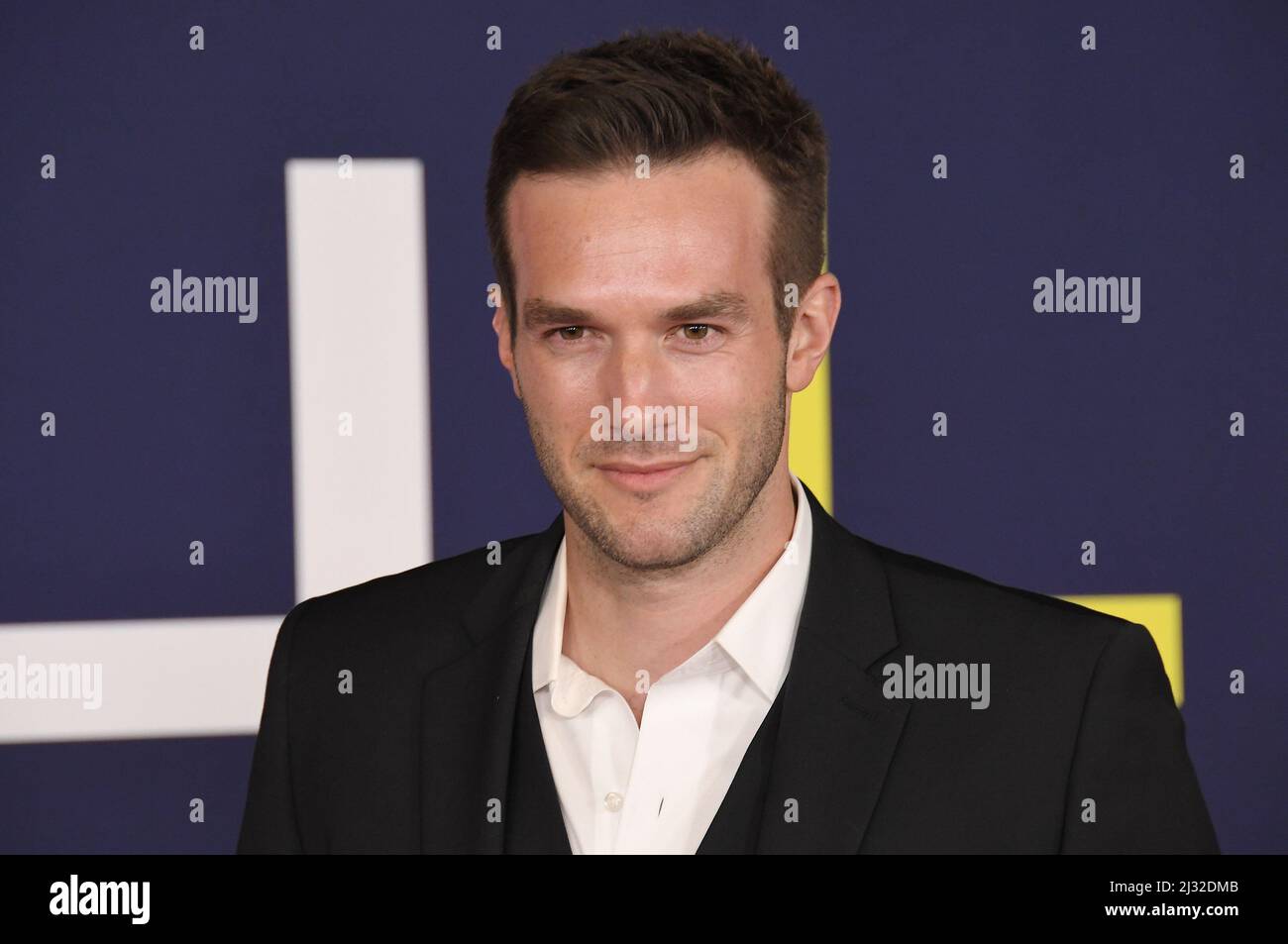 Andy Favreau arrives at the AMBULANCE Los Angeles Premiere held at the ...
