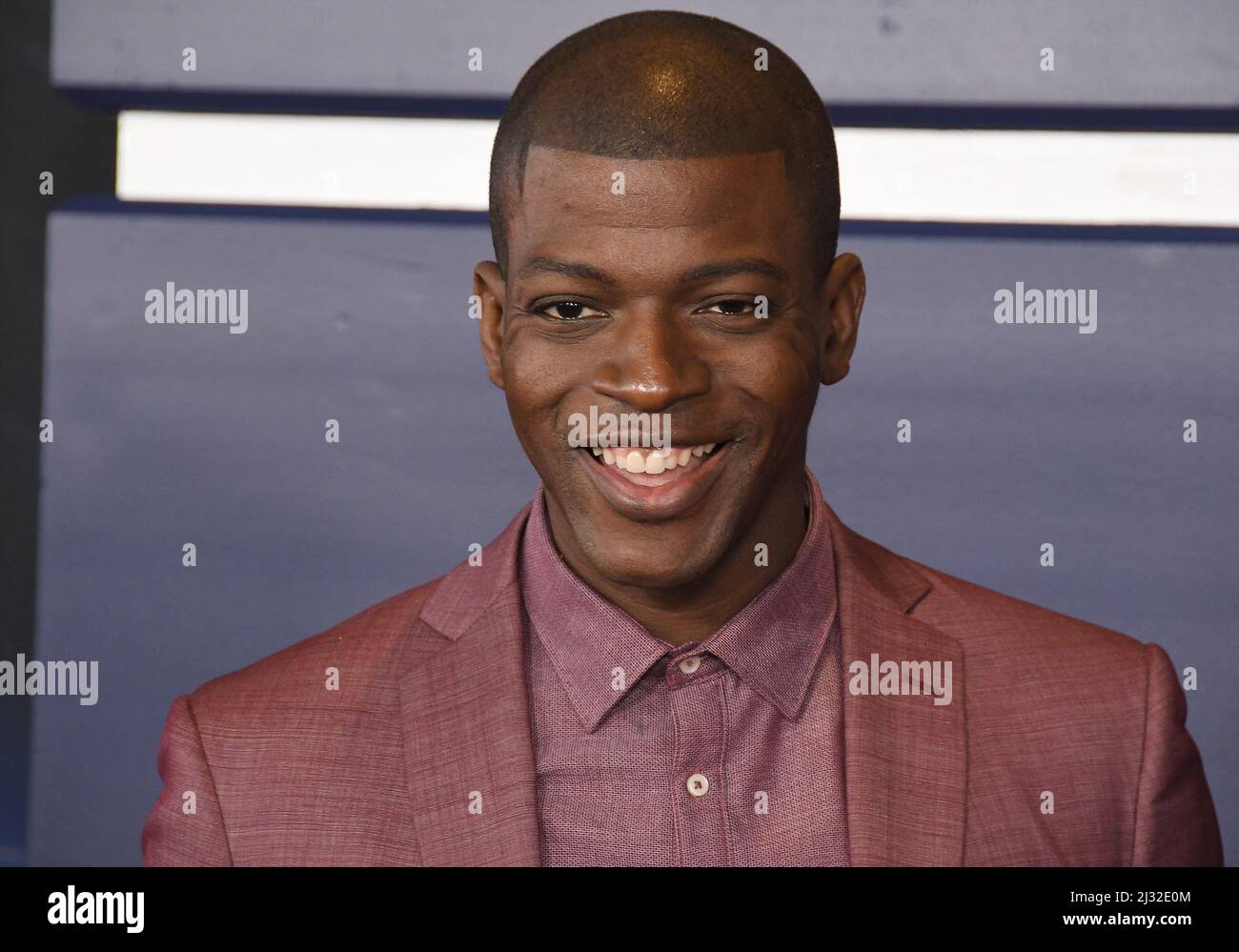 Cedric Sanders arrives at the AMBULANCE Los Angeles Premiere held at ...