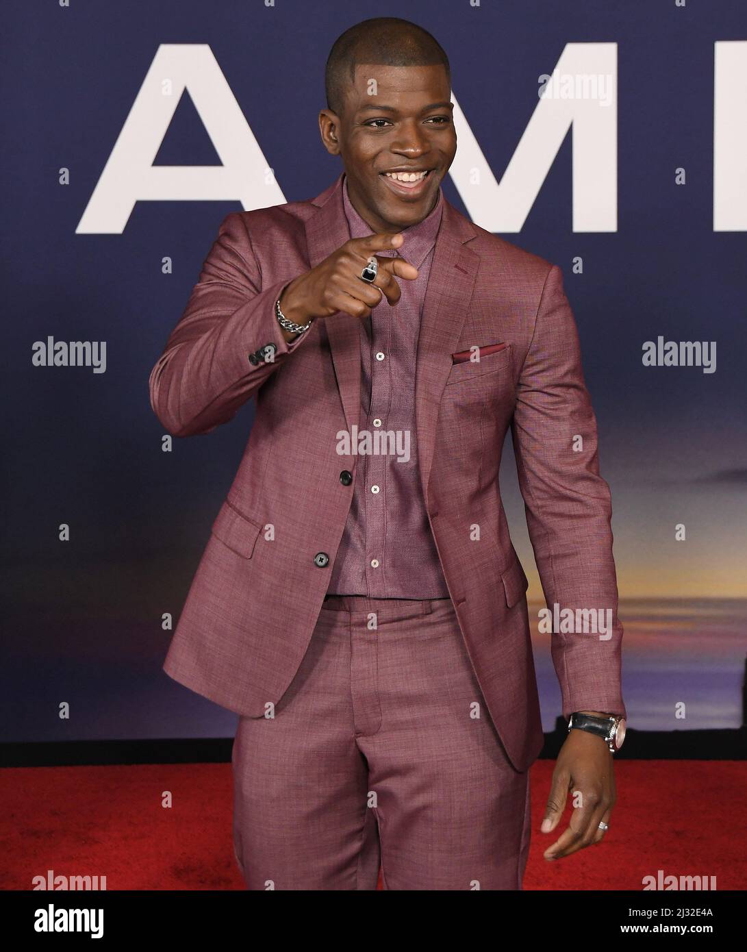 Cedric Sanders arrives at the AMBULANCE Los Angeles Premiere held at ...