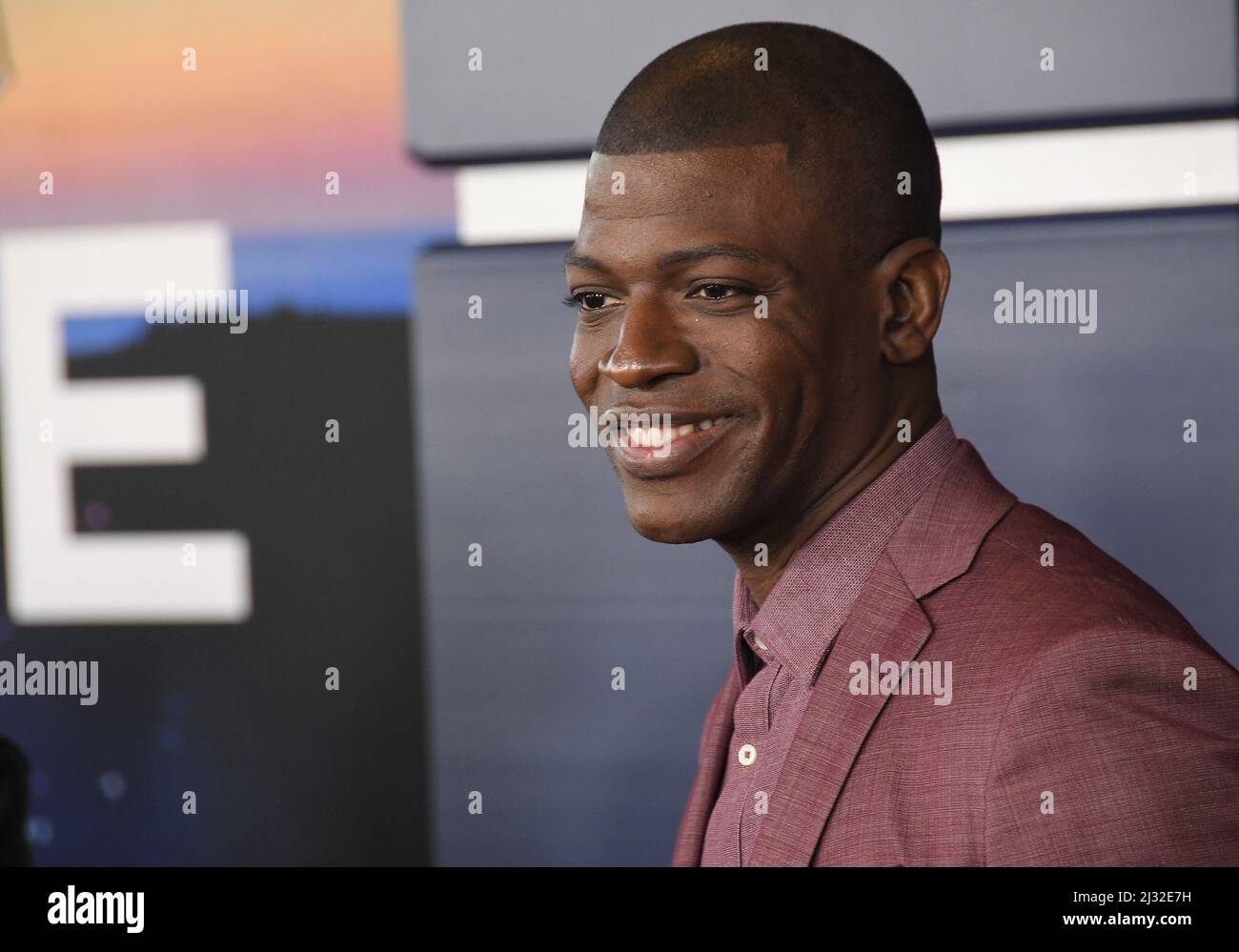 Cedric Sanders arrives at the AMBULANCE Los Angeles Premiere held at ...