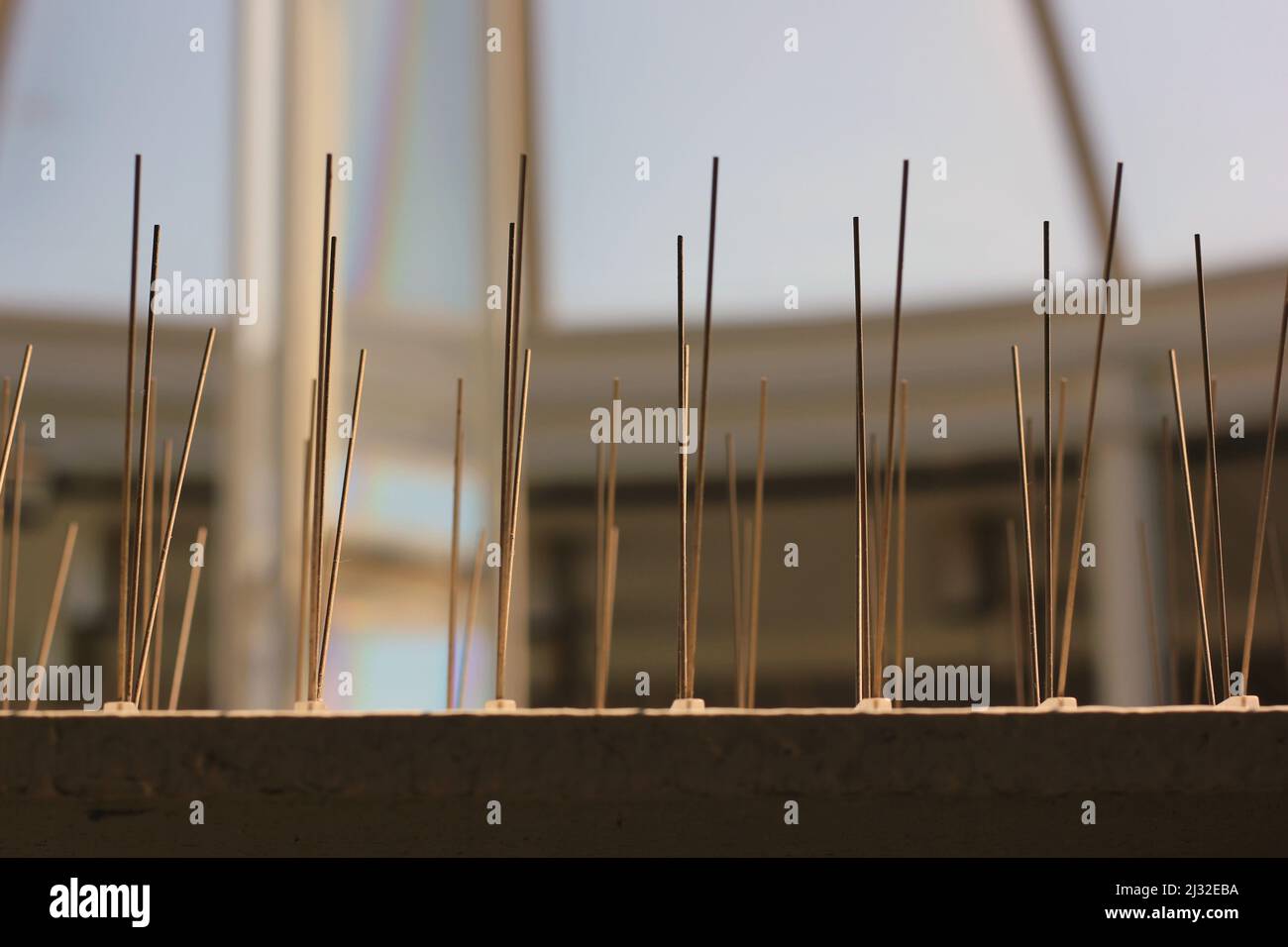 Sharp bird control wires sticking out in a dangerous fashion Stock ...