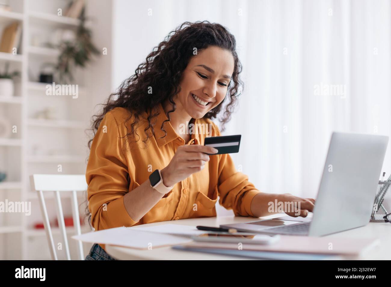 Arabic Lady Shopping Using Laptop And Credit Card At Workplace Stock ...